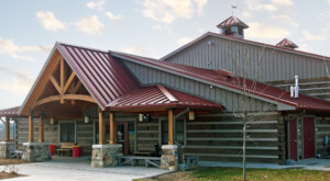 Red Metal Roofing & Walls: Pros, Cons, & Project Photos - Sheffield Metals